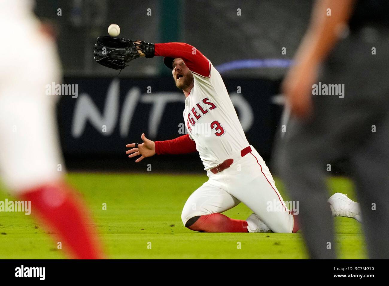 Los Angeles Angels left fielder Taylor Ward makes a catch a ball hit by ...
