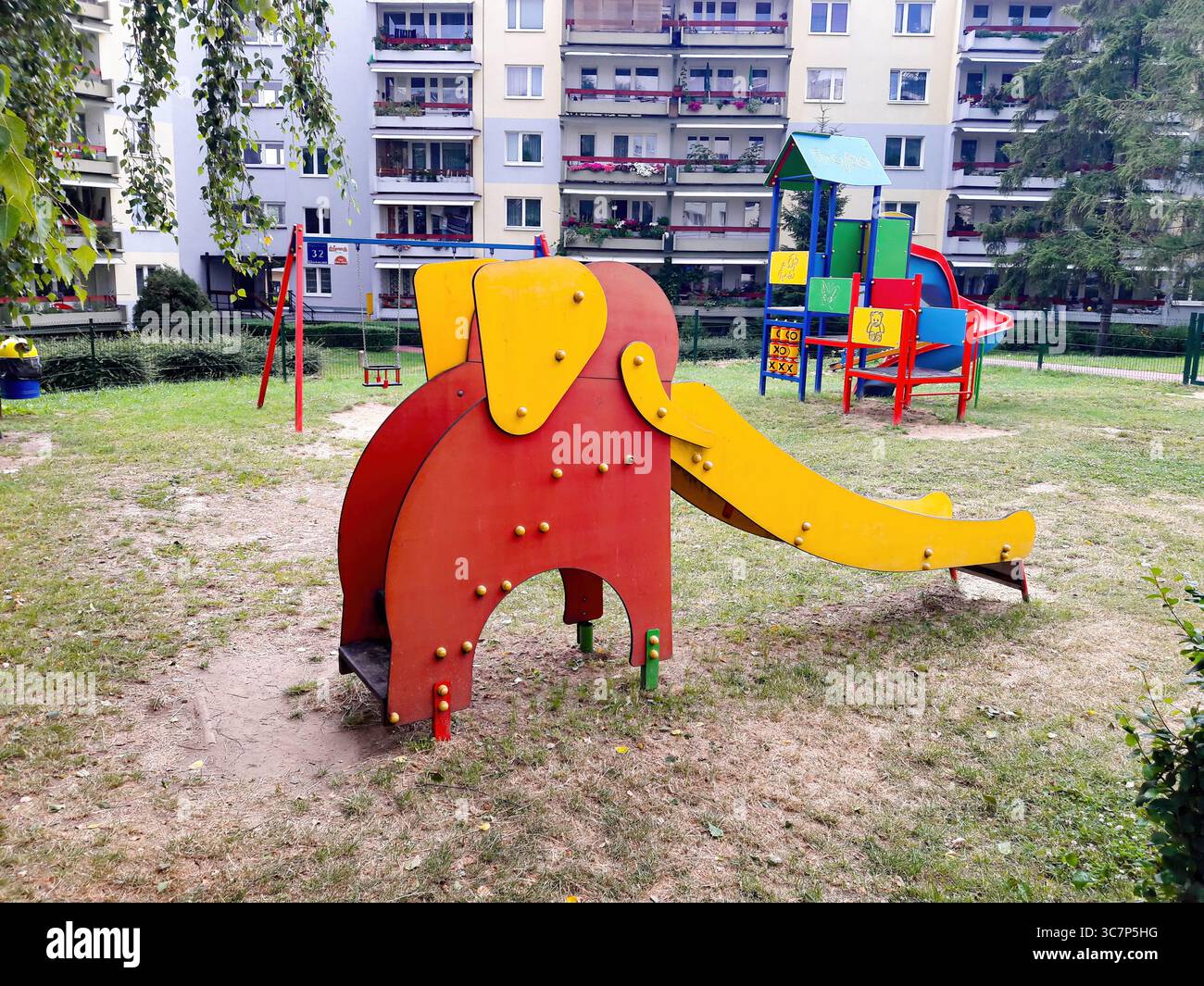 Experience a Delightful and Colorful Elephant Slide in a Vibrant Urban ...
