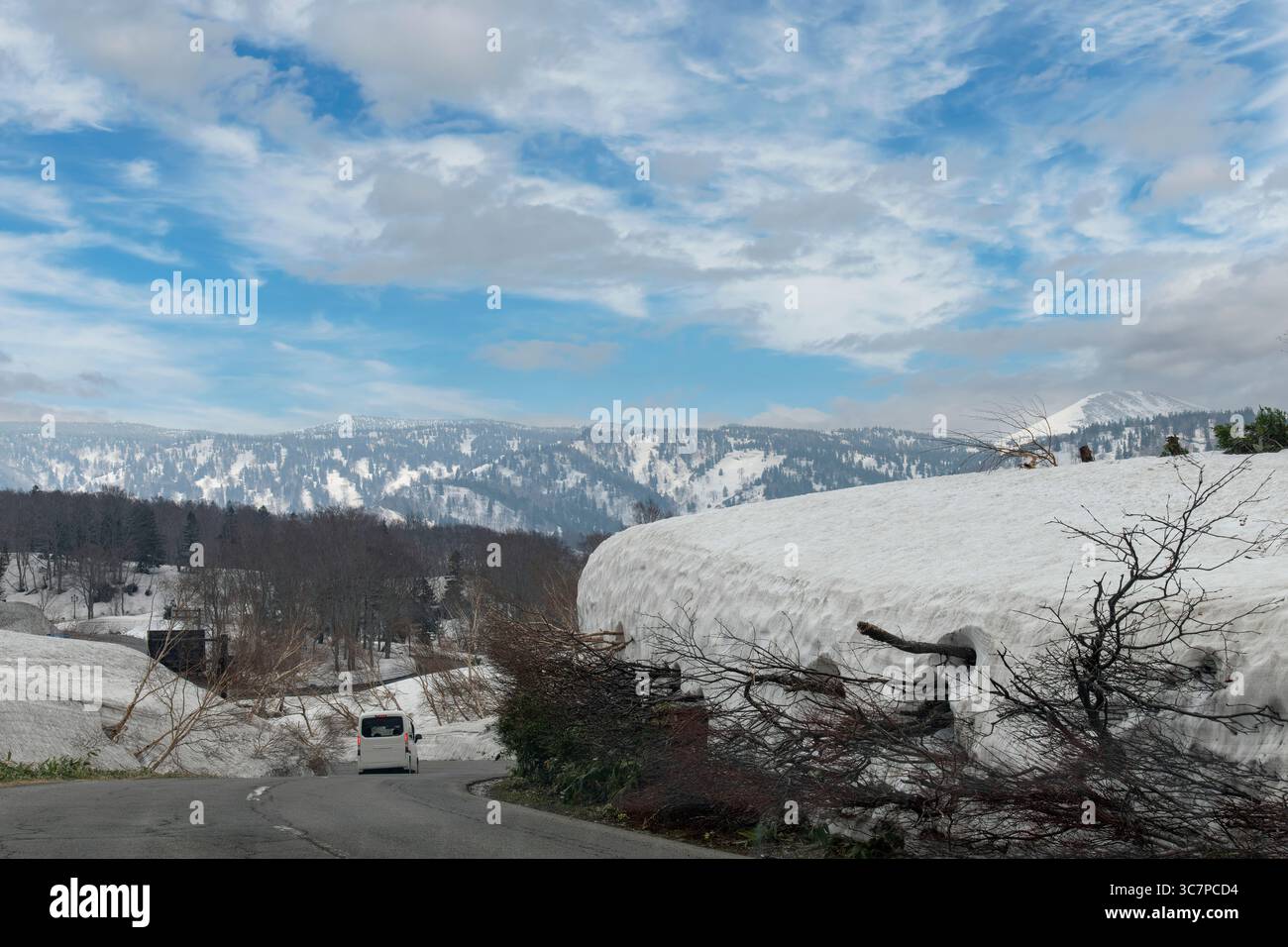 Snow wall lines the side of National Route 103 from Aomori, Japan ...