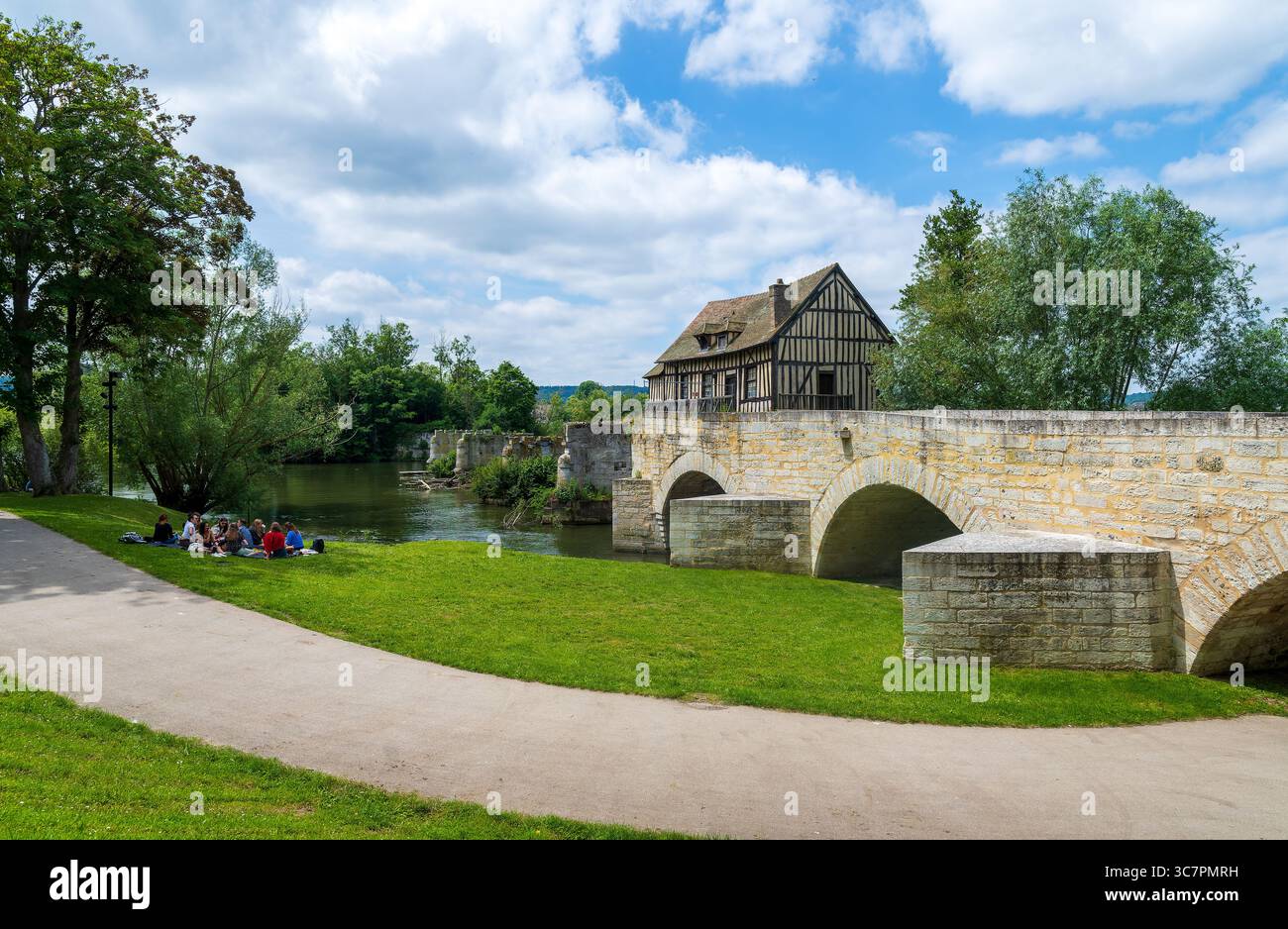 The Old Mill of Vernon in Normandy, France, perched on the arches of a ...