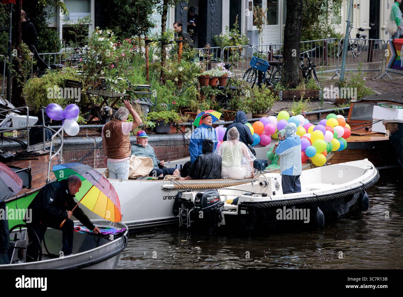 AMSTERDAM - Boats on the route prior to the Canal Parade. The boat ...