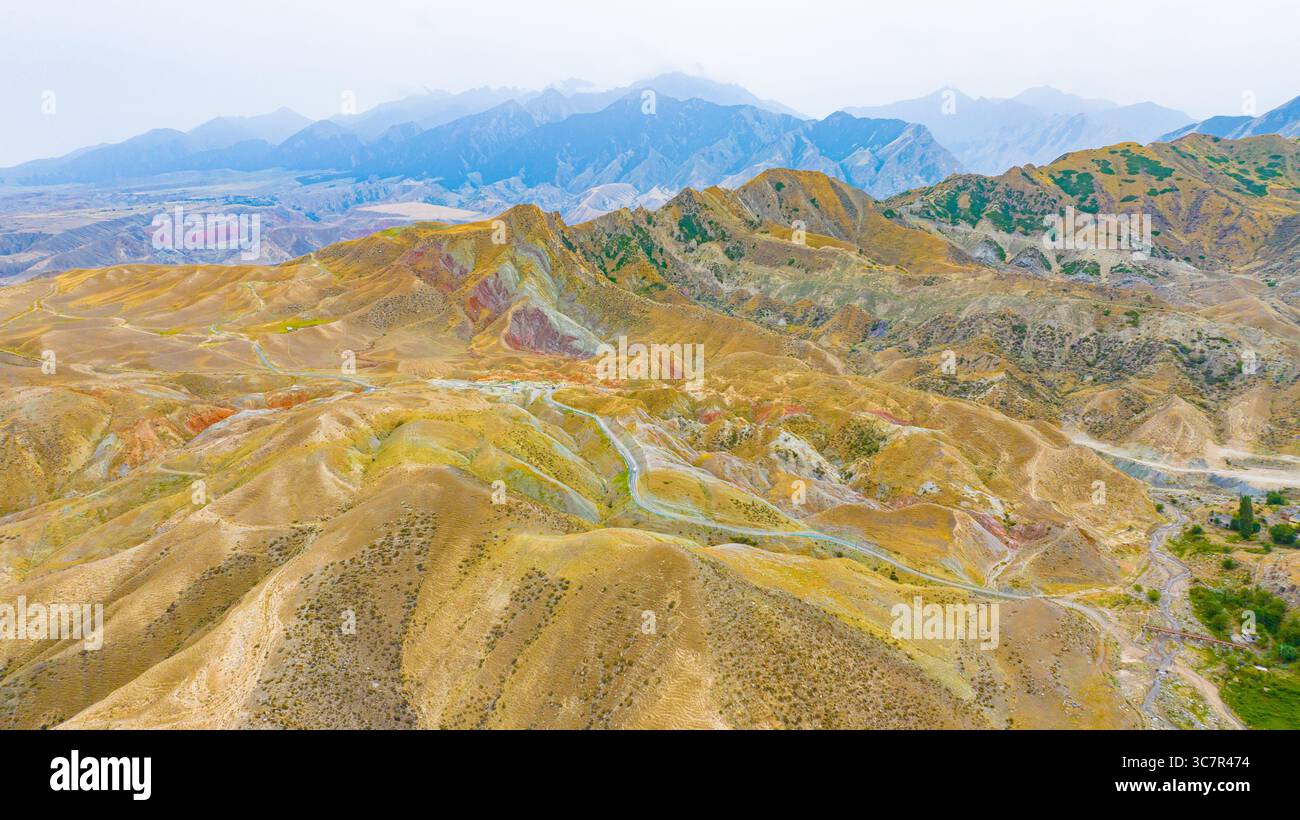 WUSU, CHINA - JULY 28, 2025 - Tourists view the Danxia landform formed ...
