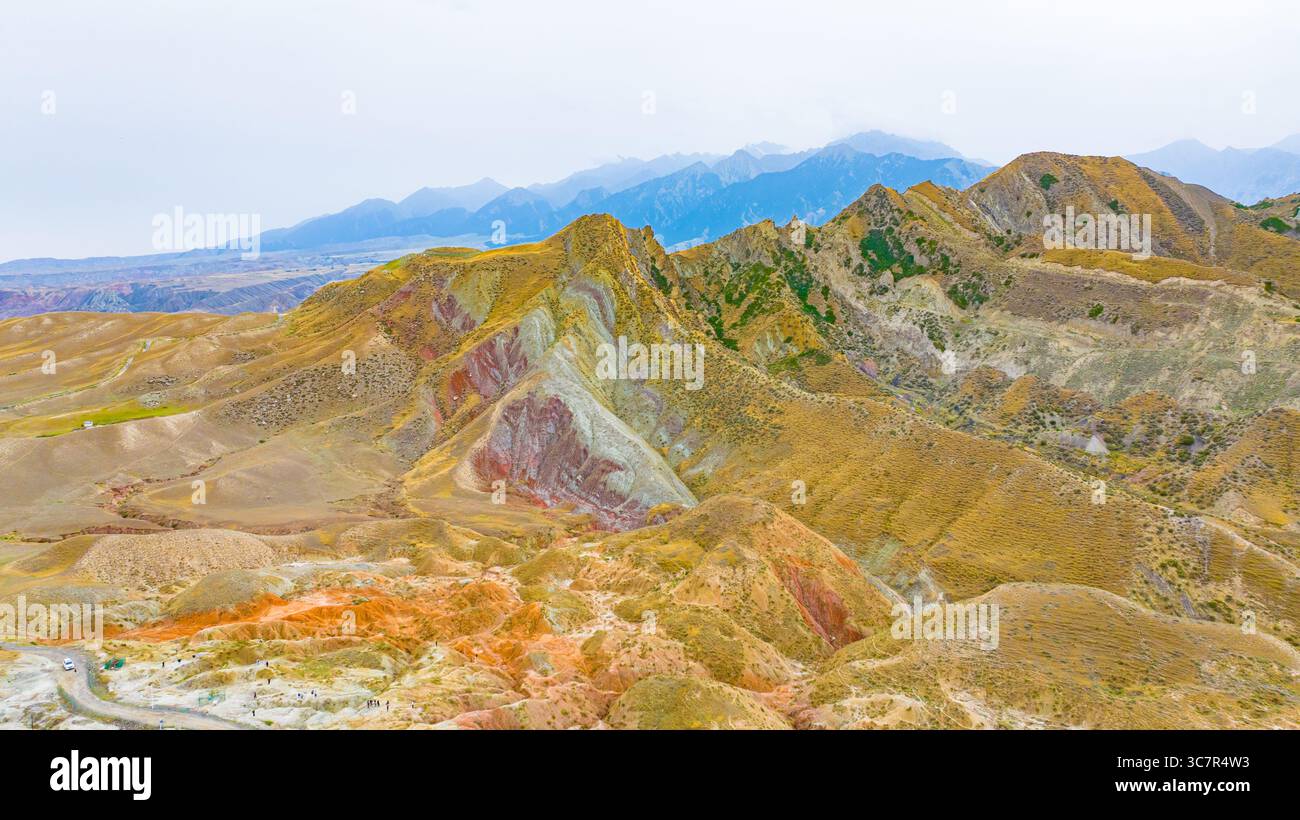 WUSU, CHINA - JULY 28, 2025 - Tourists view the Danxia landform formed ...
