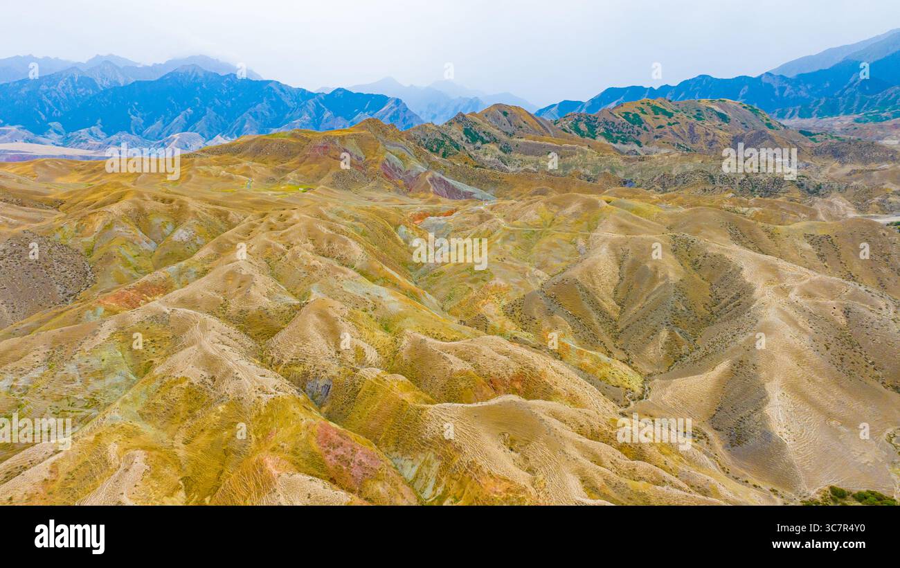 WUSU, CHINA - JULY 28, 2025 - Tourists view the Danxia landform formed ...