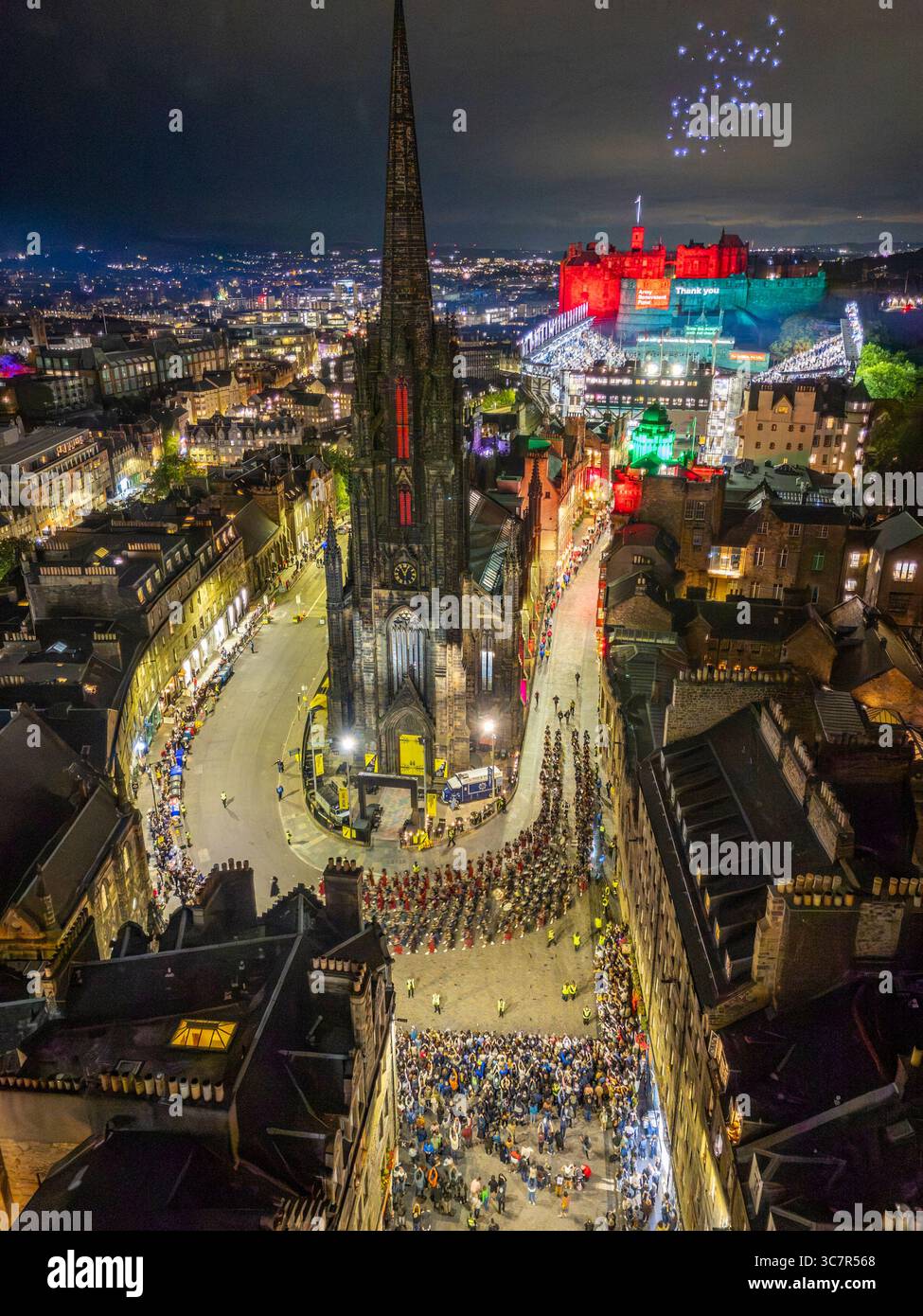 Edinburgh, Scotland, UK. 1st August 2025. Aerial view of piped band ...