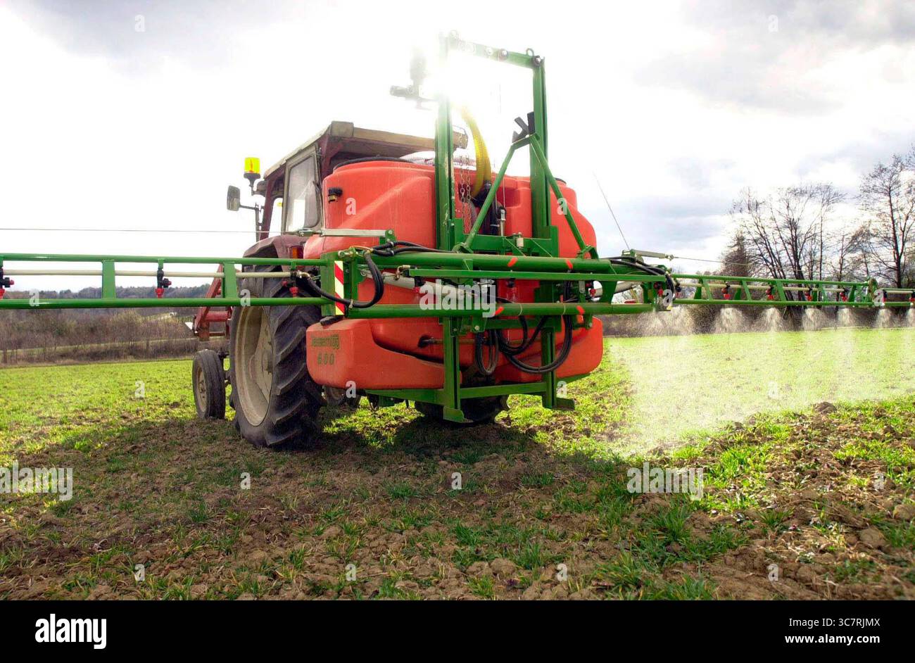 Spraying chemical protection products on the field land cultivation ...