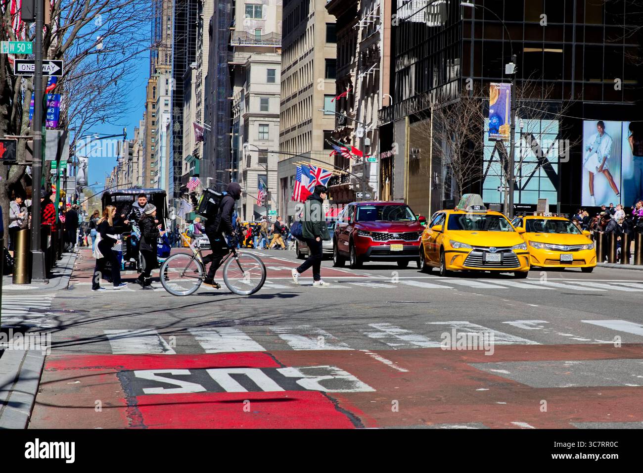 Yellow pedestrian street crossing flags hi-res stock photography and ...