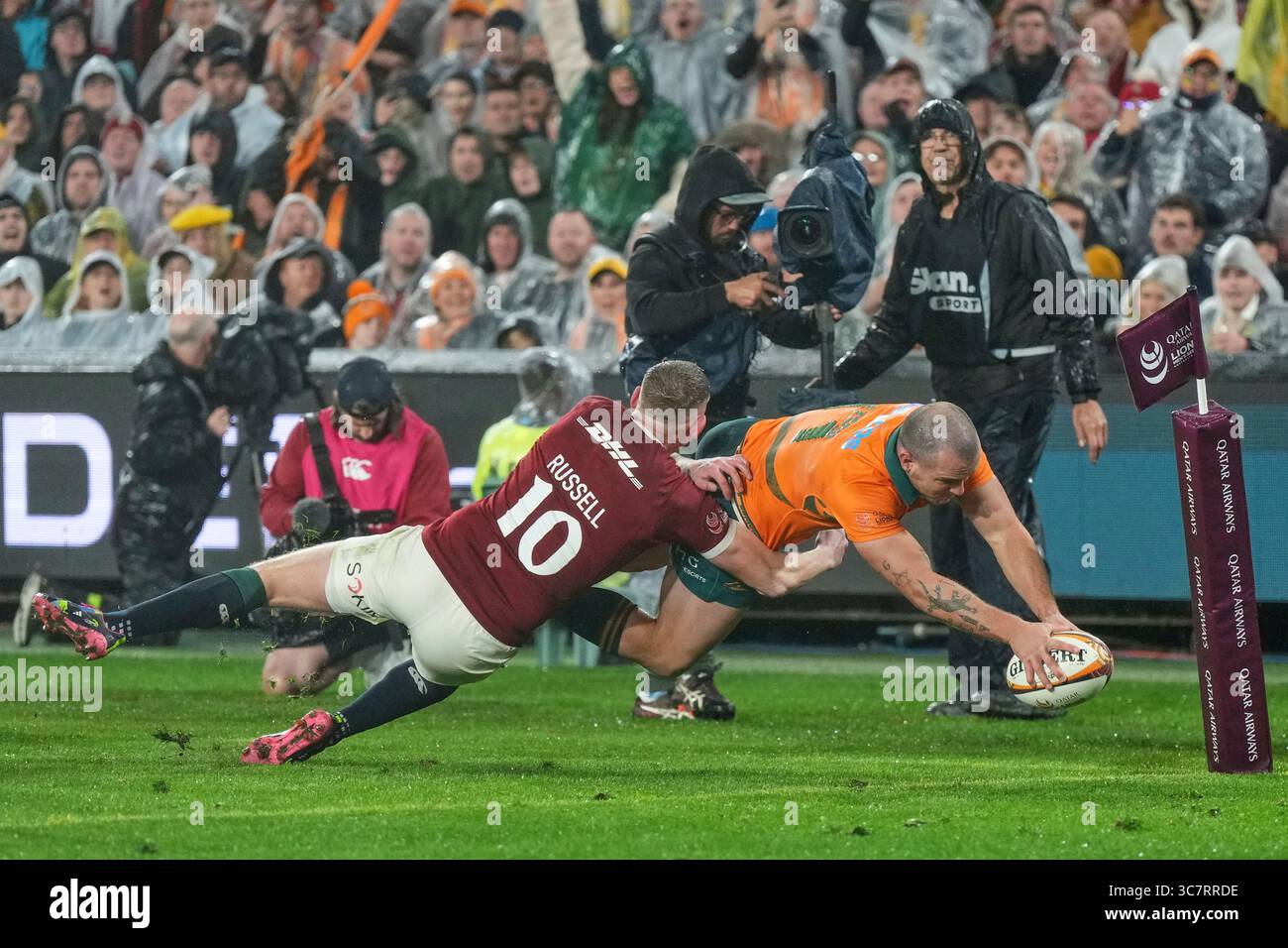 Australia's Dylan Pietsch goes over to score the opening try despite ...