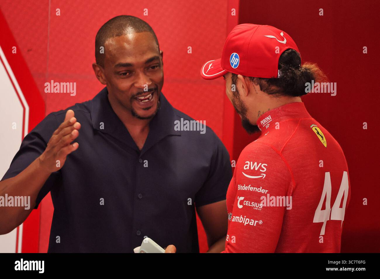(L to R): Anthony Mackie (USA) Actor, Ferrari guest, with Lewis ...