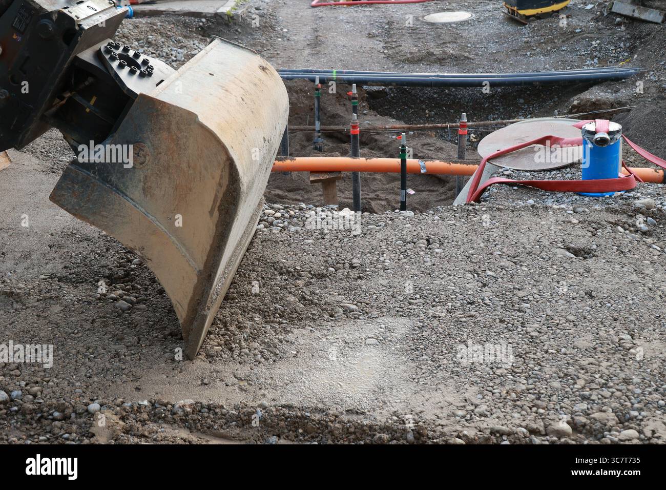 Large construction site with a large shovel digging into the ground ...