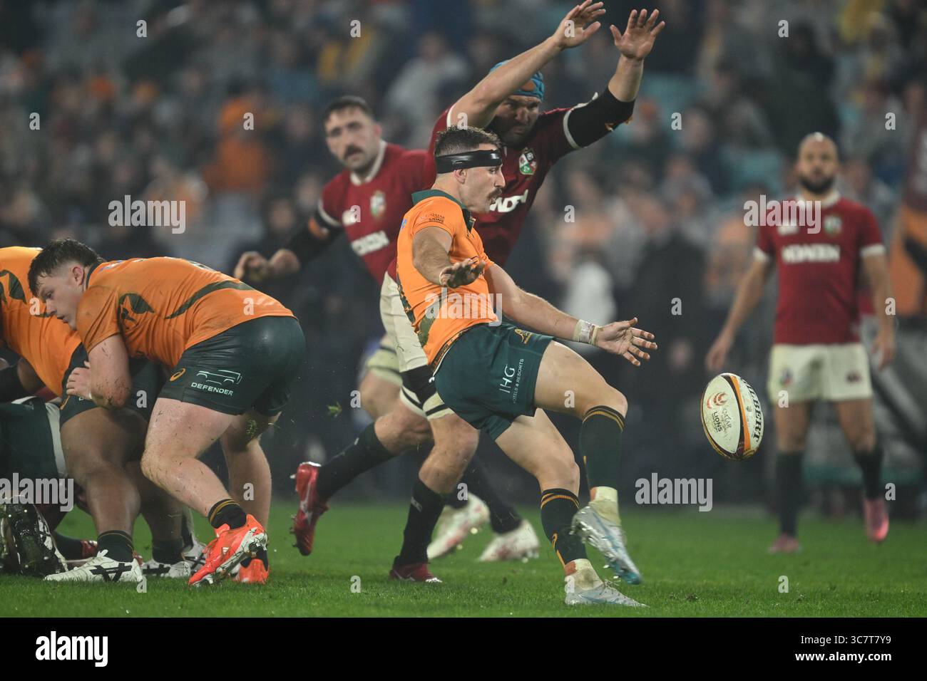 Nic White of Australia getsb an kick away during the Third Test match ...