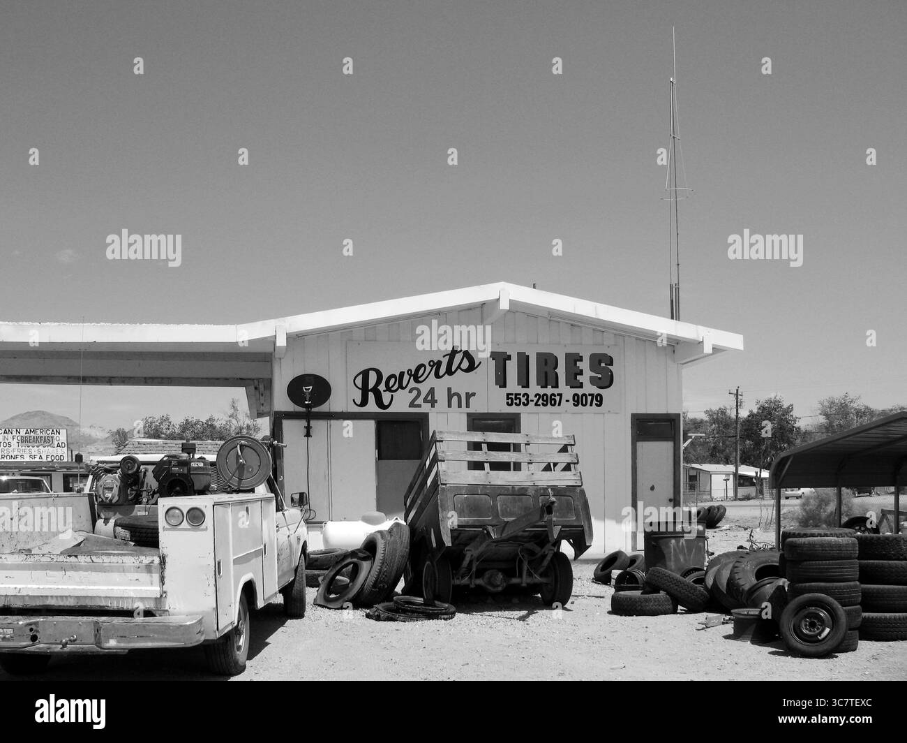 Outdoor auto repair shop Black and White Stock Photos & Images - Alamy