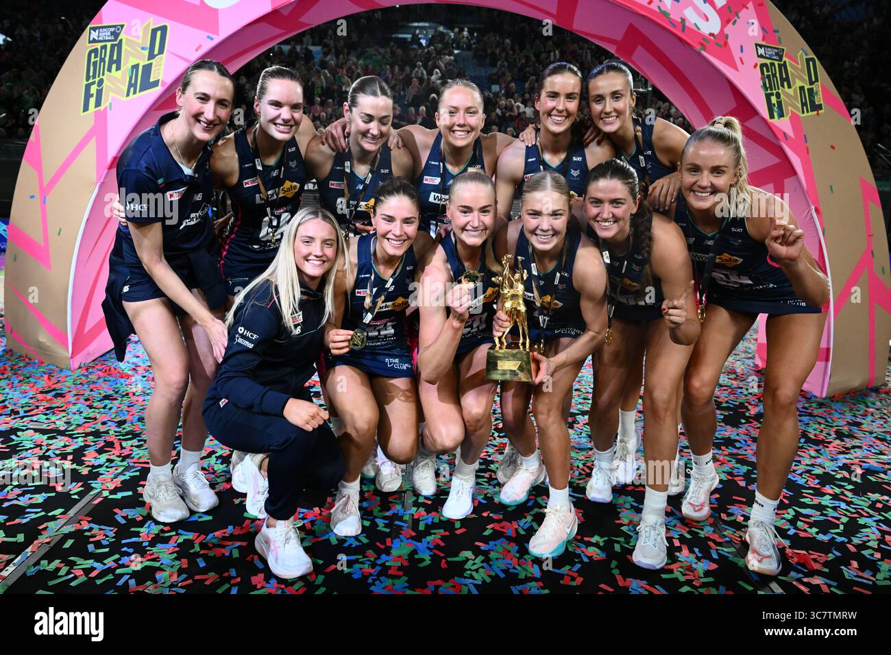 Melbourne Vixens players celebrate following the Super Netball Grand ...