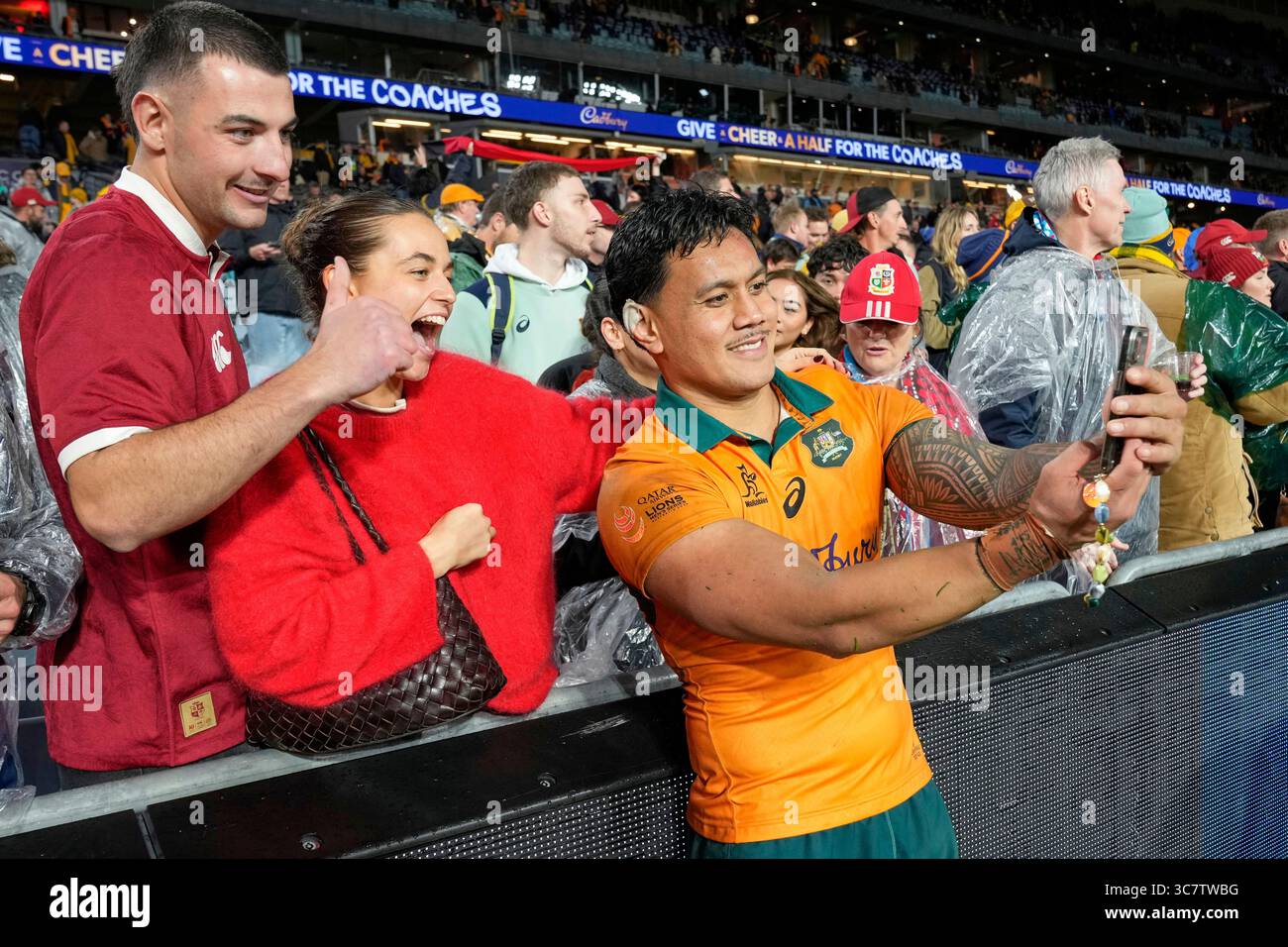 Australia's Len Ikitau poses for a photo with fans after his team won ...