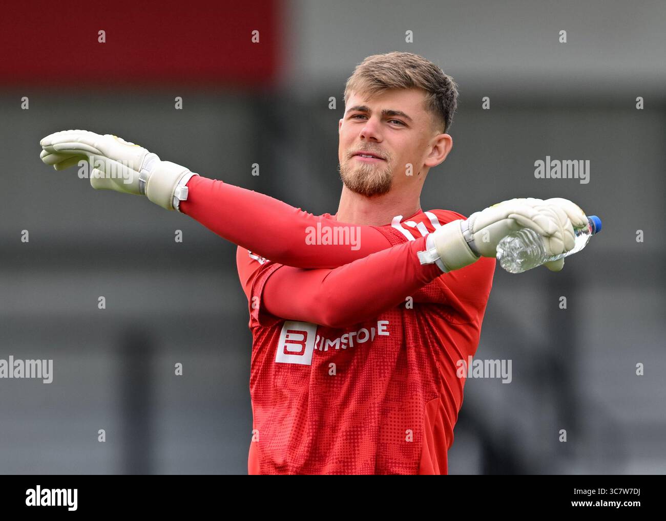Crewe Alexandra goalkeeper Tom Booth warms up ahead of the Sky Bet League Two match at the ...