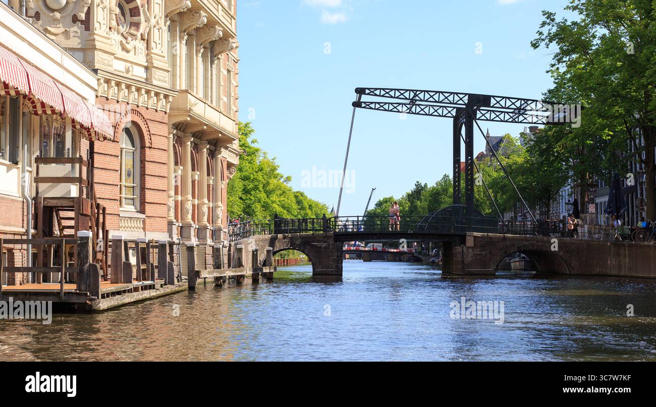 Scenic Cruise along the Amstel River in Amsterdam, with an old ...