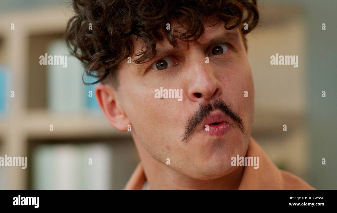 Close up face male funny happy man businessman wonder surprised guy wow ...