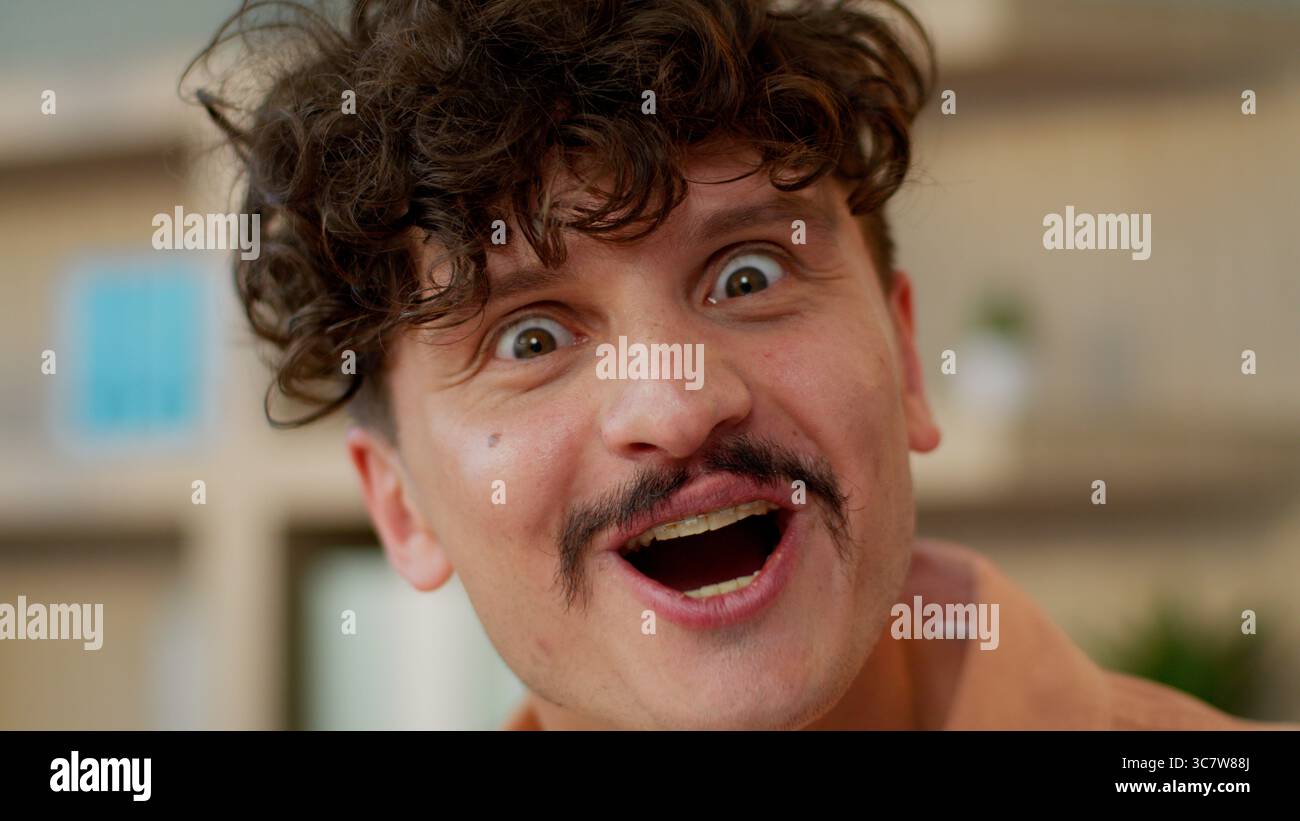 Close up face male funny happy man businessman wonder surprised guy wow ...