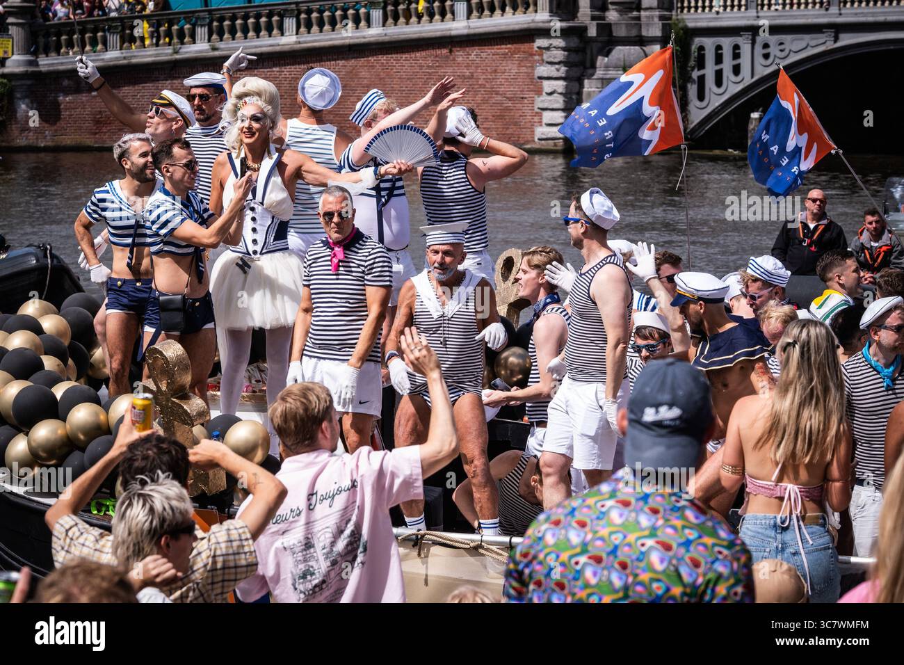 AMSTERDAM - Participants during the Canal Parade. The boat parade with ...