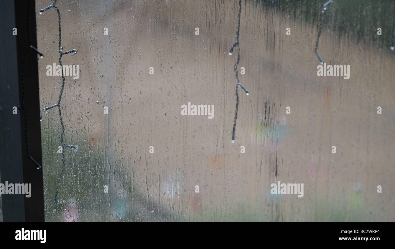 Rainy window string lights hi-res stock photography and images - Alamy
