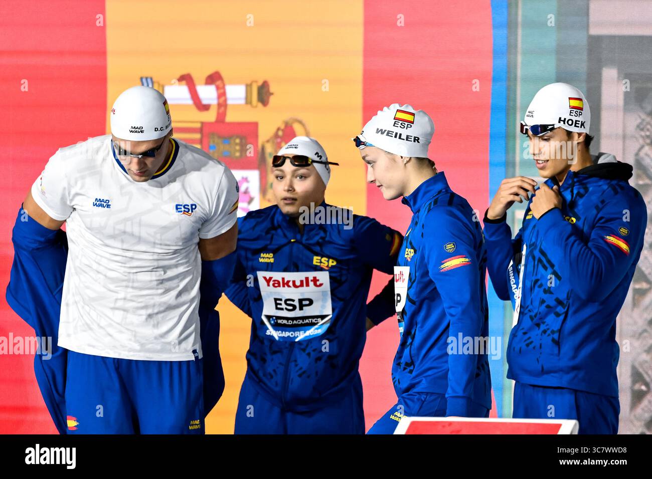 Athletes of team Spain prepare to compete in the swimming 4x100m ...