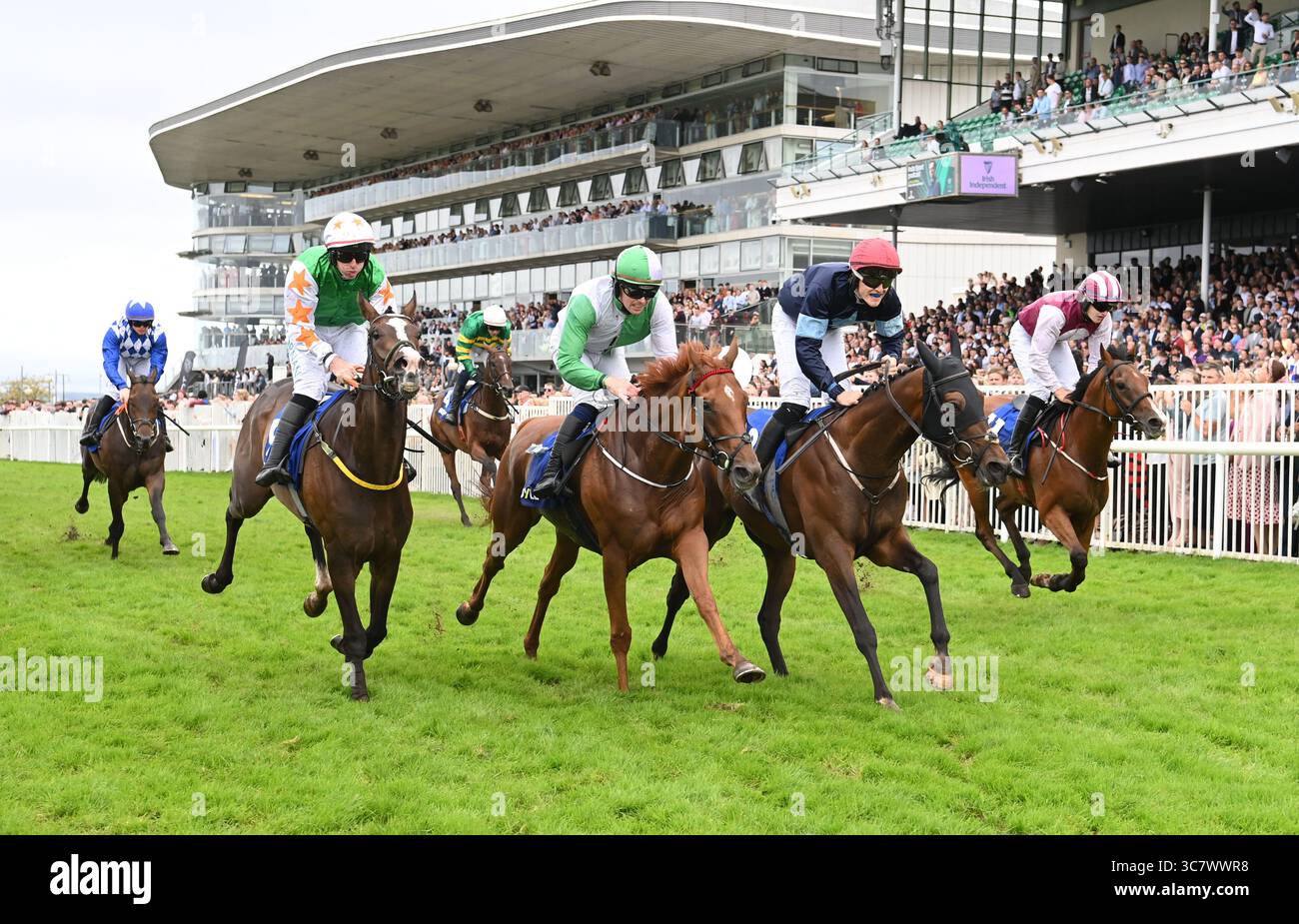 Come On The Lads and jockey Eoin Staples (2nd right, red cap) wins the ...