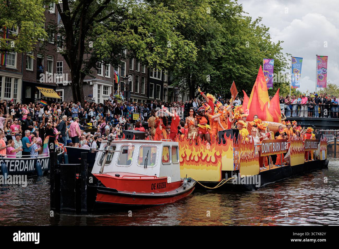 AMSTERDAM - Boats during the Canal Parade. The boat parade with eighty ...
