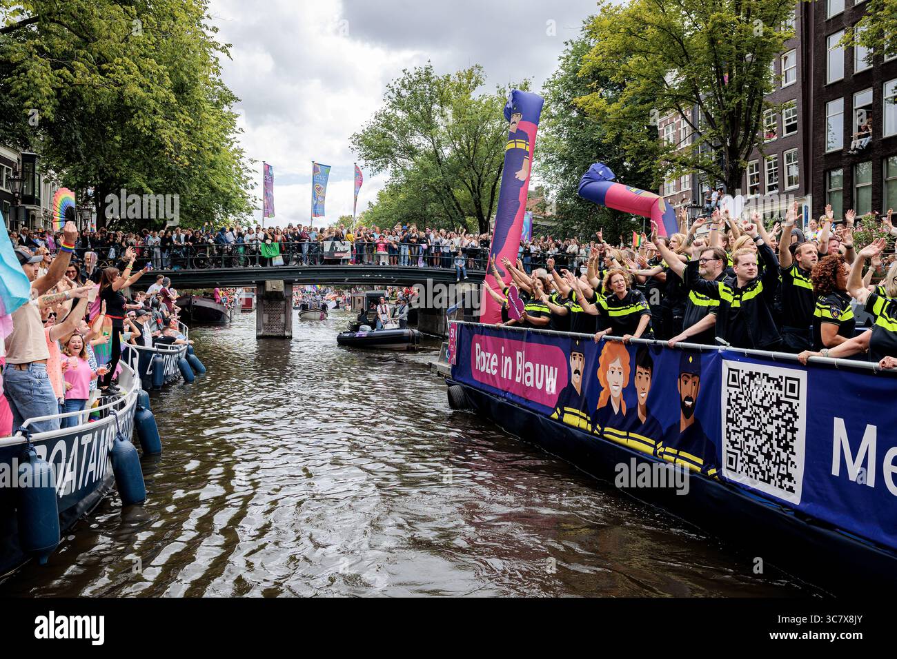 AMSTERDAM - Boats during the Canal Parade. The boat parade with eighty ...