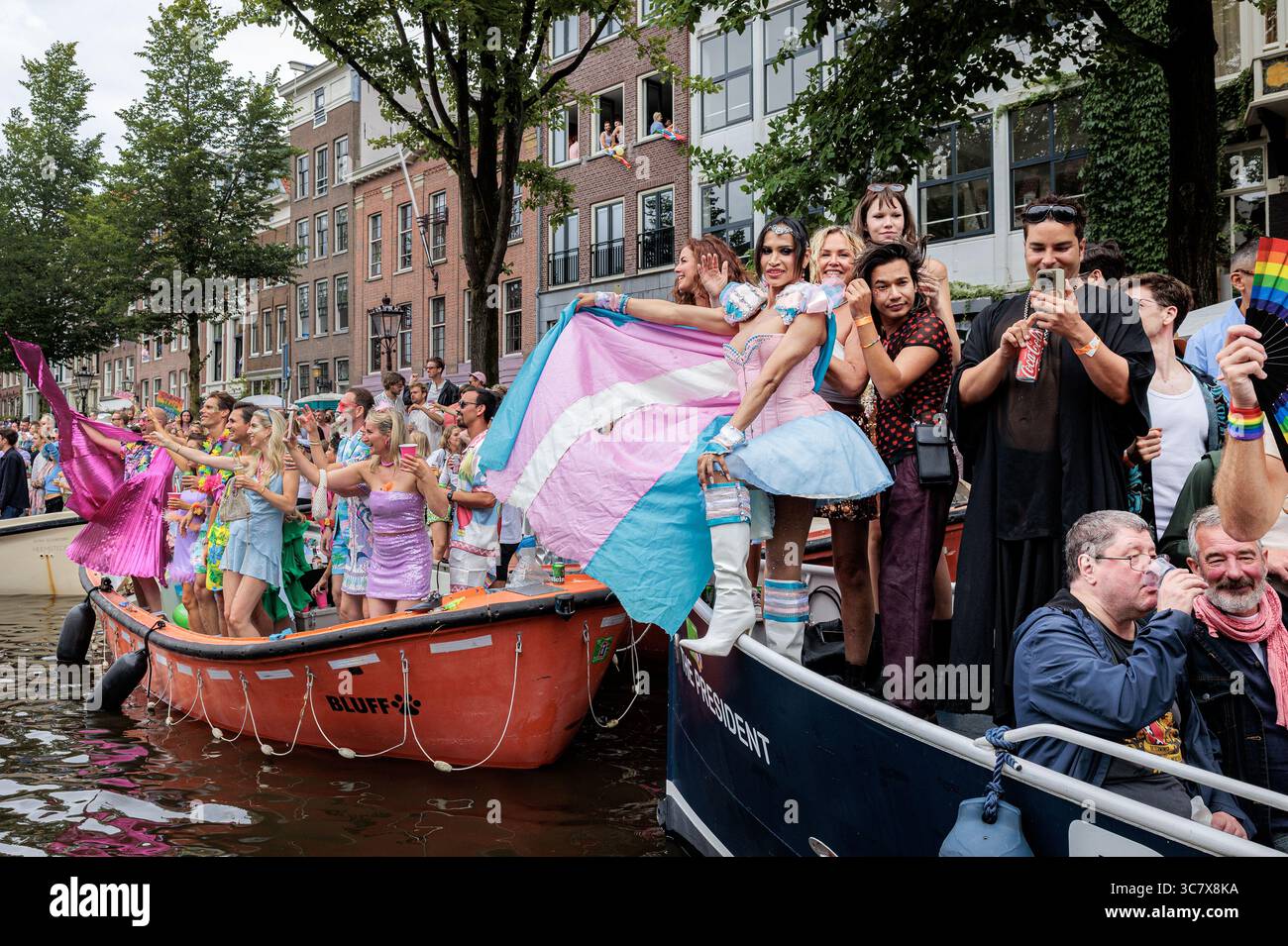 AMSTERDAM - Boats during the Canal Parade. The boat parade with eighty ...