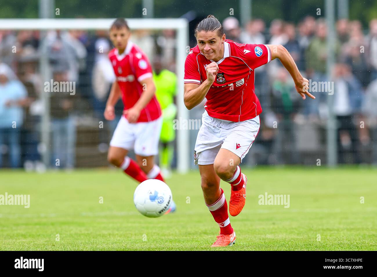 VEENDAM, NETHERLANDS - AUGUST 2: George Dobson of Wrexham AFC runs with ...