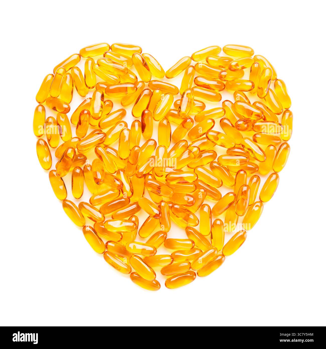 liver oil shaped like a heart on white Stock Photo - Alamy