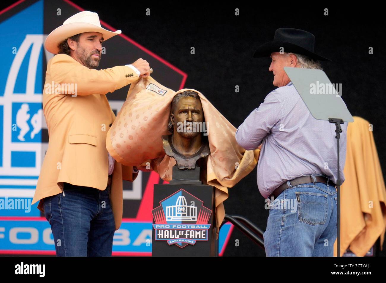 Former NFL player Jared Allen, left, and his father Ronald Allen unveil ...
