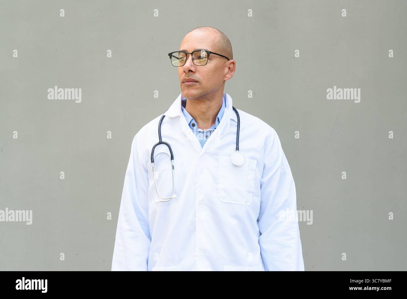 Professional male doctor wearing stethoscope hi-res stock photography ...