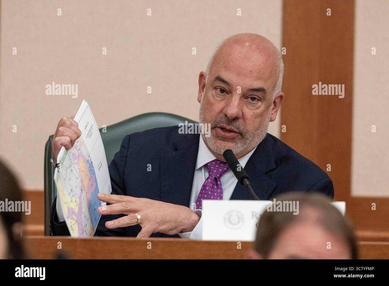 State Rep. Chris Turner, D-Grand Prairie, questions a witness about redistricting maps during ...