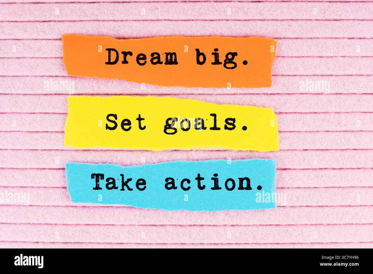 Torn paper with quotes dream big. Set goals. Take action on pink ...