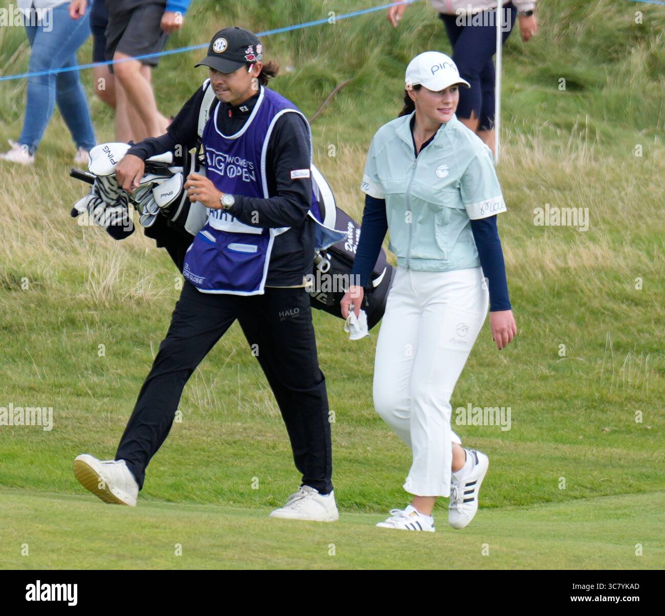 Porthcawl,UK, 02 Aug 2025 Darcey Harry walks with her caddie during the AIG Womens Open 2025 Day ...