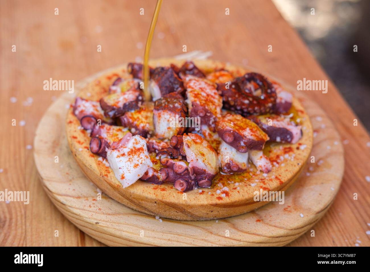 The Finishing Touch for a Delicious Octopus Recipe. Concept The moment ...