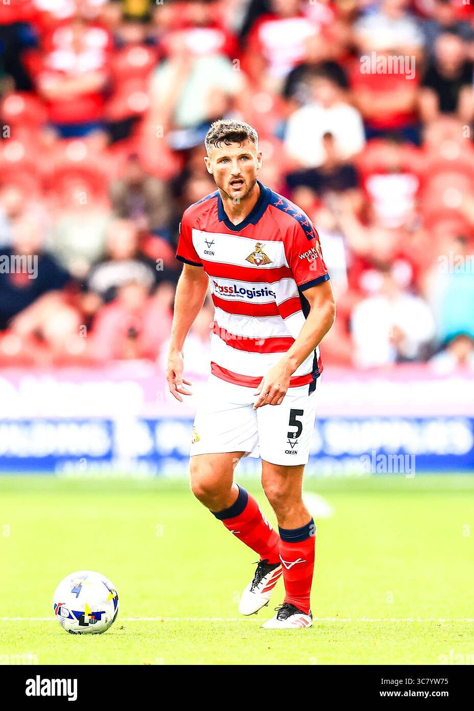 Matty Pearson of Doncaster Rovers on the ball during the Sky Bet League ...