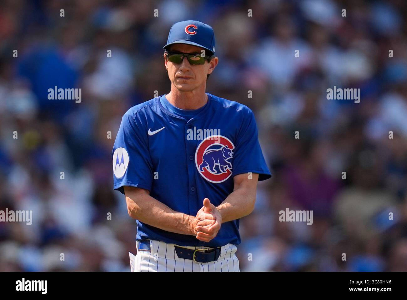 Chicago Cubs manager Craig Counsell makes a pitching change during the ...