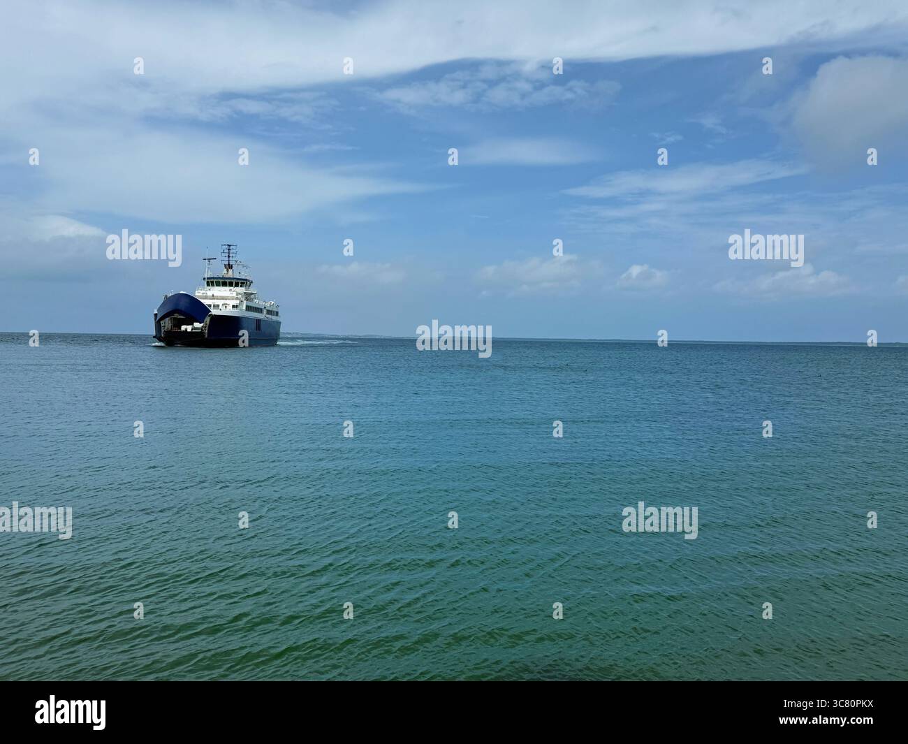 Ship opening its bow as it approaches the harbour, Samsoe, Jutland ...