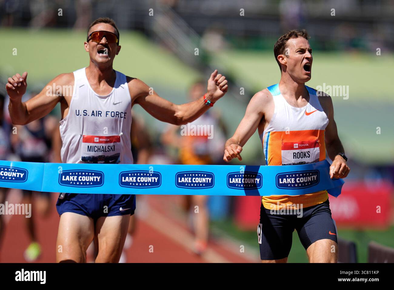 Kenneth Rooks, right, wins the men's 3,000-meter steeplechase final at ...