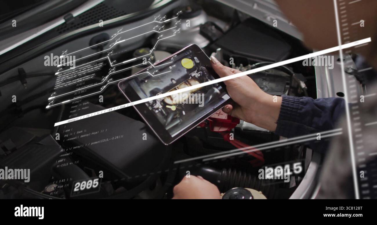 Auto technician wearing dark jacket analyzing engine in garage with ...