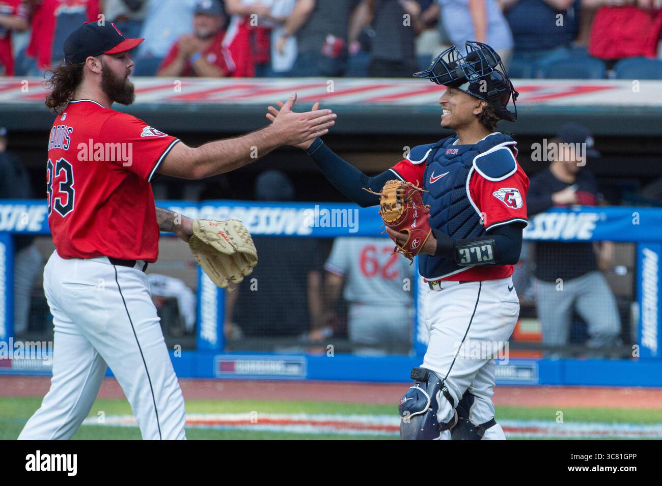 Cleveland Guardians starting pitcher Hunter Gaddis, left, is ...