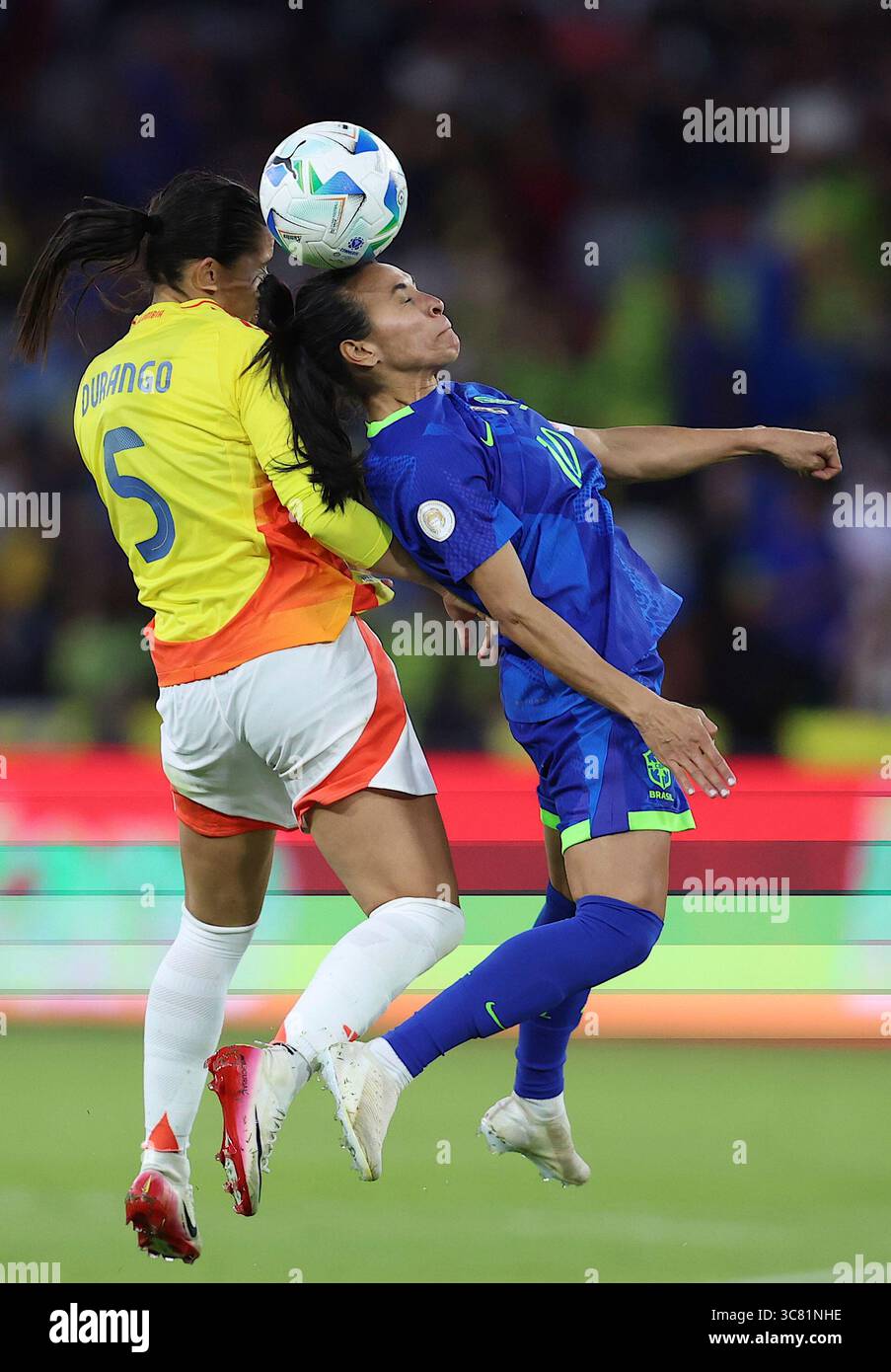 Brazil's Marta, right, and Colombia's Lorena Bedoya jump for a header ...