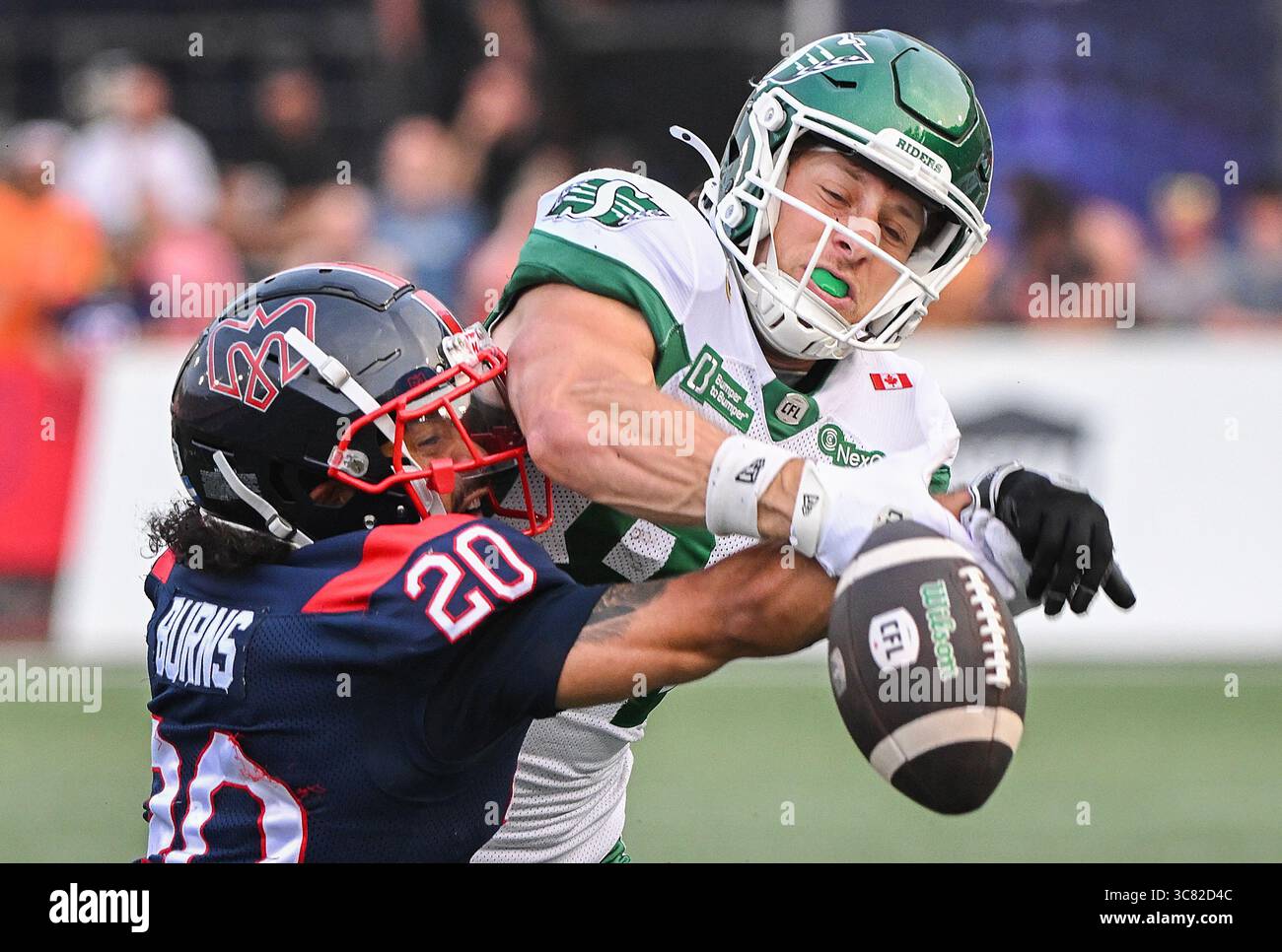 Montreal Alouettes' Lorenzo Burns (20) challenges Saskatchewan ...