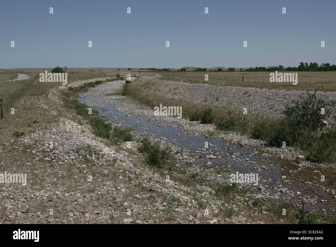 Irrigation canal feeds water from Teton River diversion dam to Bynum ...