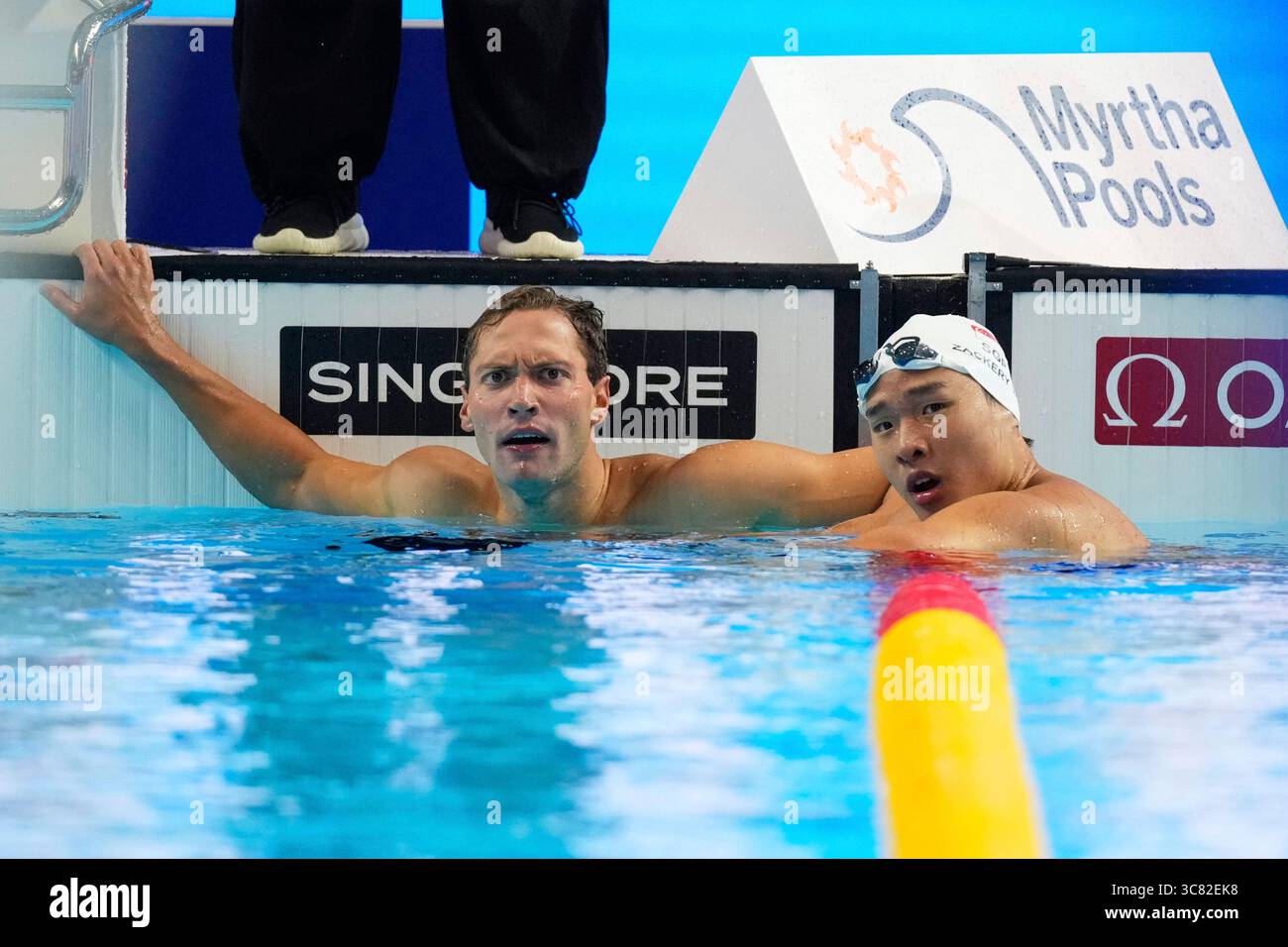 Munzer Mark Kabbara of Lebanon, left, and Zackery Quan Long Tay of ...