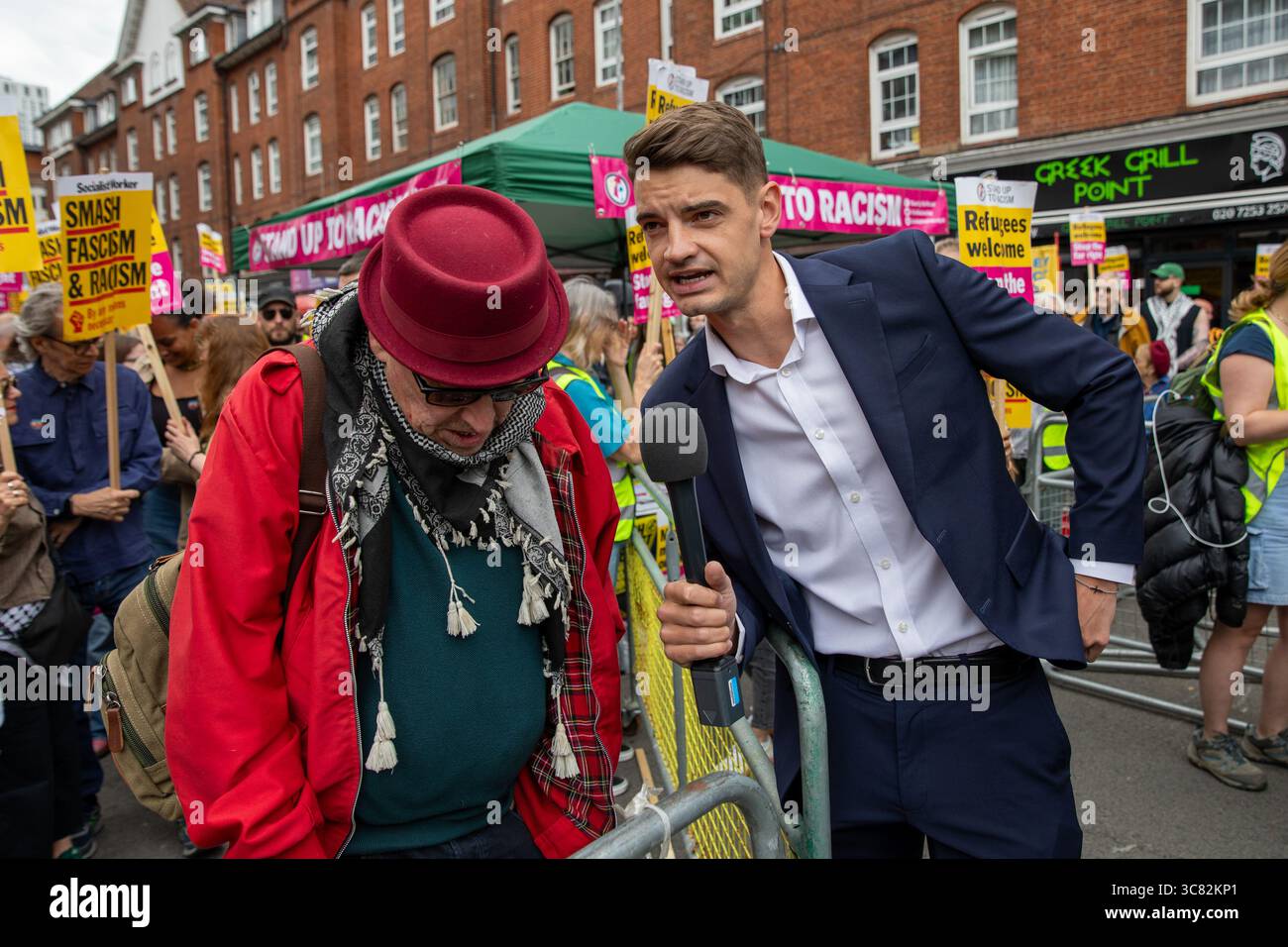 GB News presenter Ben Leo, asks a protestor questions during the ...