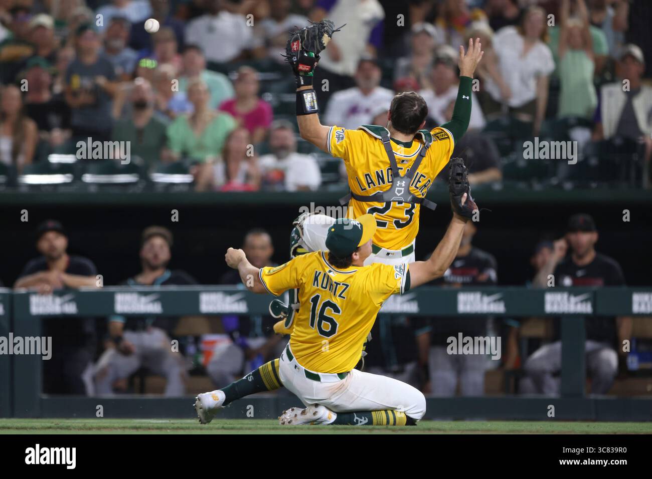 Athletics first baseman Nick Kurtz (16) and catcher Shea Langeliers ...