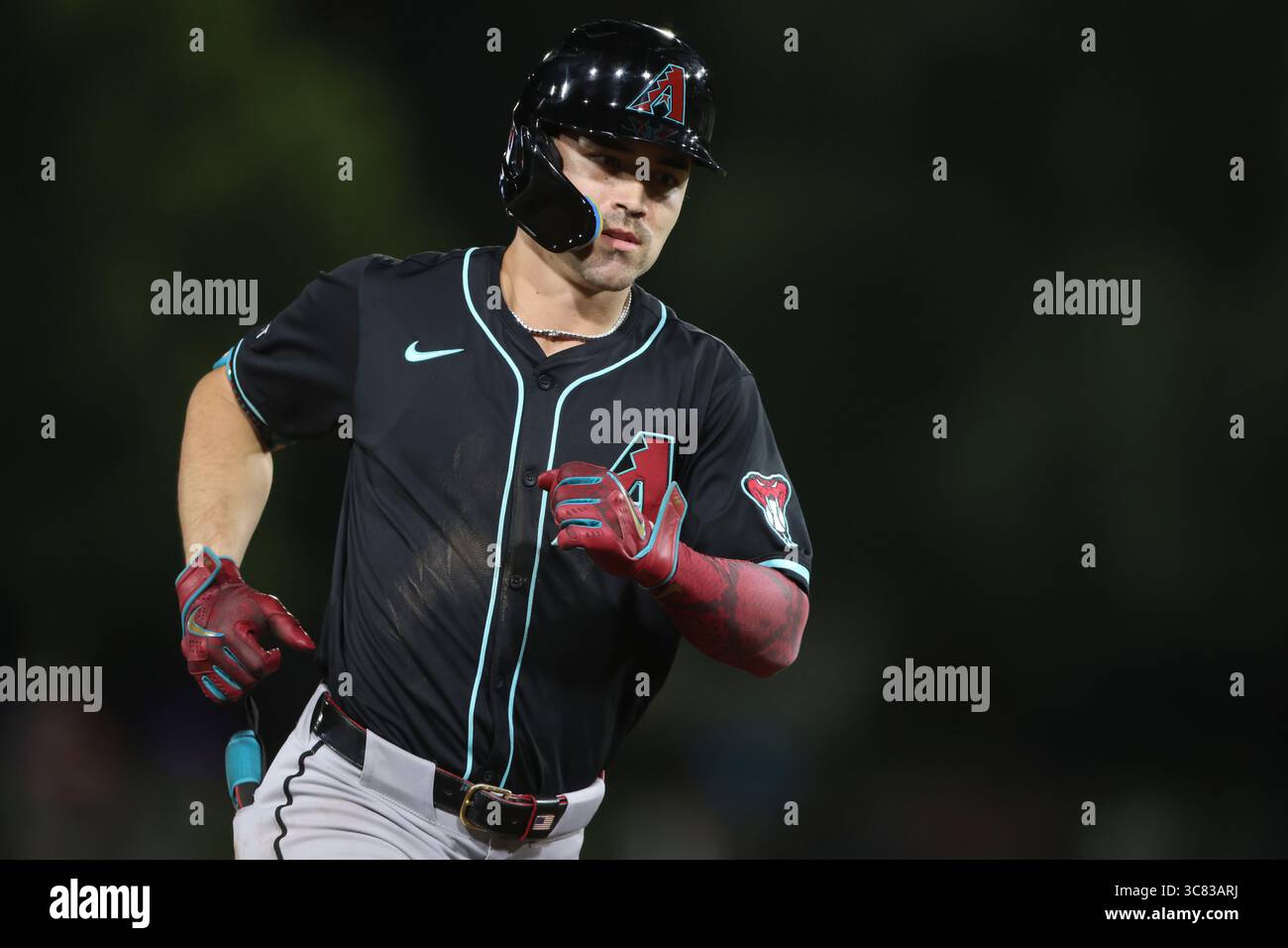 Arizona Diamondbacks' Corbin Carroll jogs around the bases after his ...